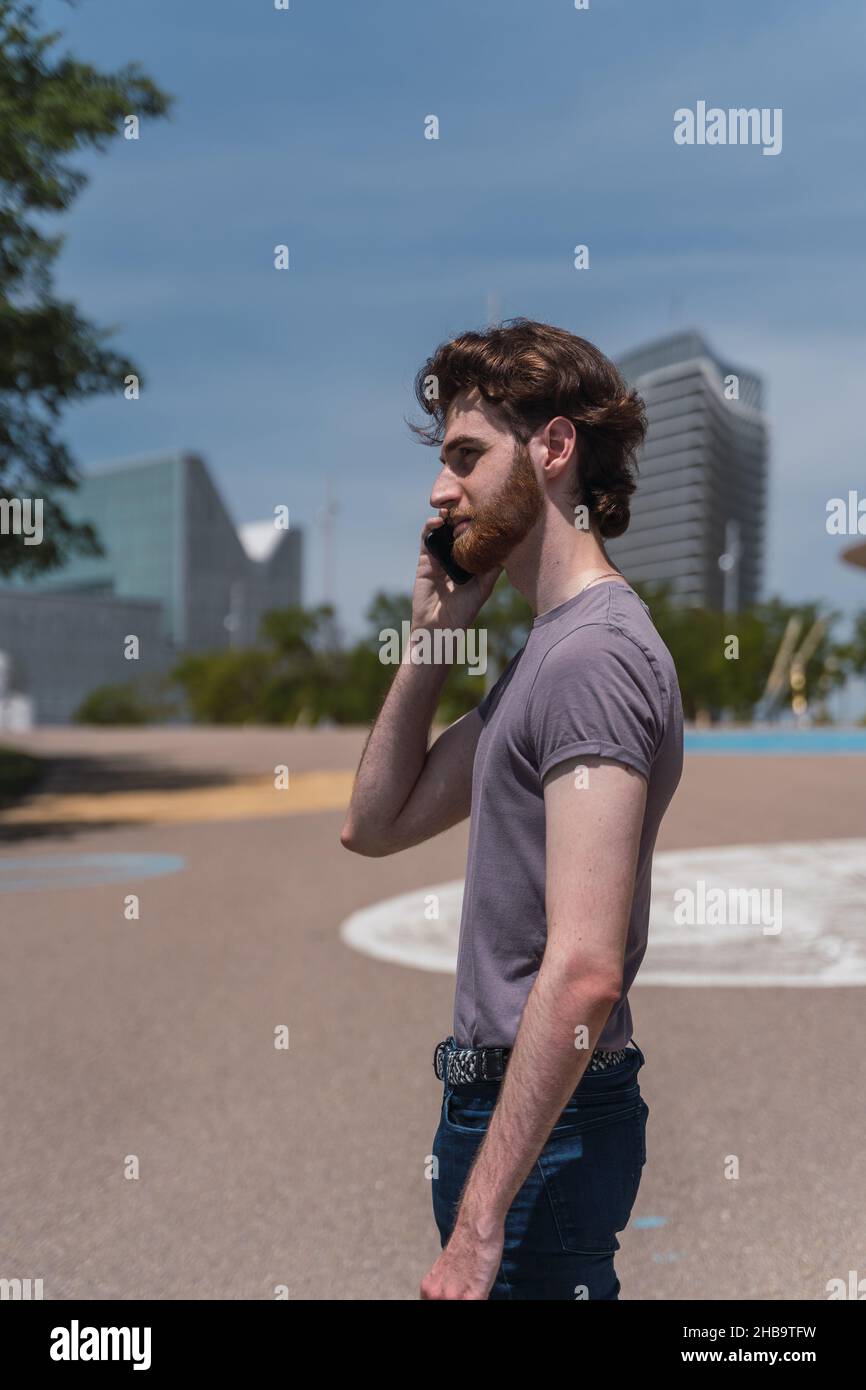Serious boy on phone hi-res stock photography and images - Alamy