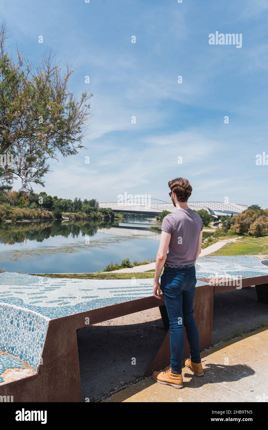 man looking at the river Stock Photo - Alamy