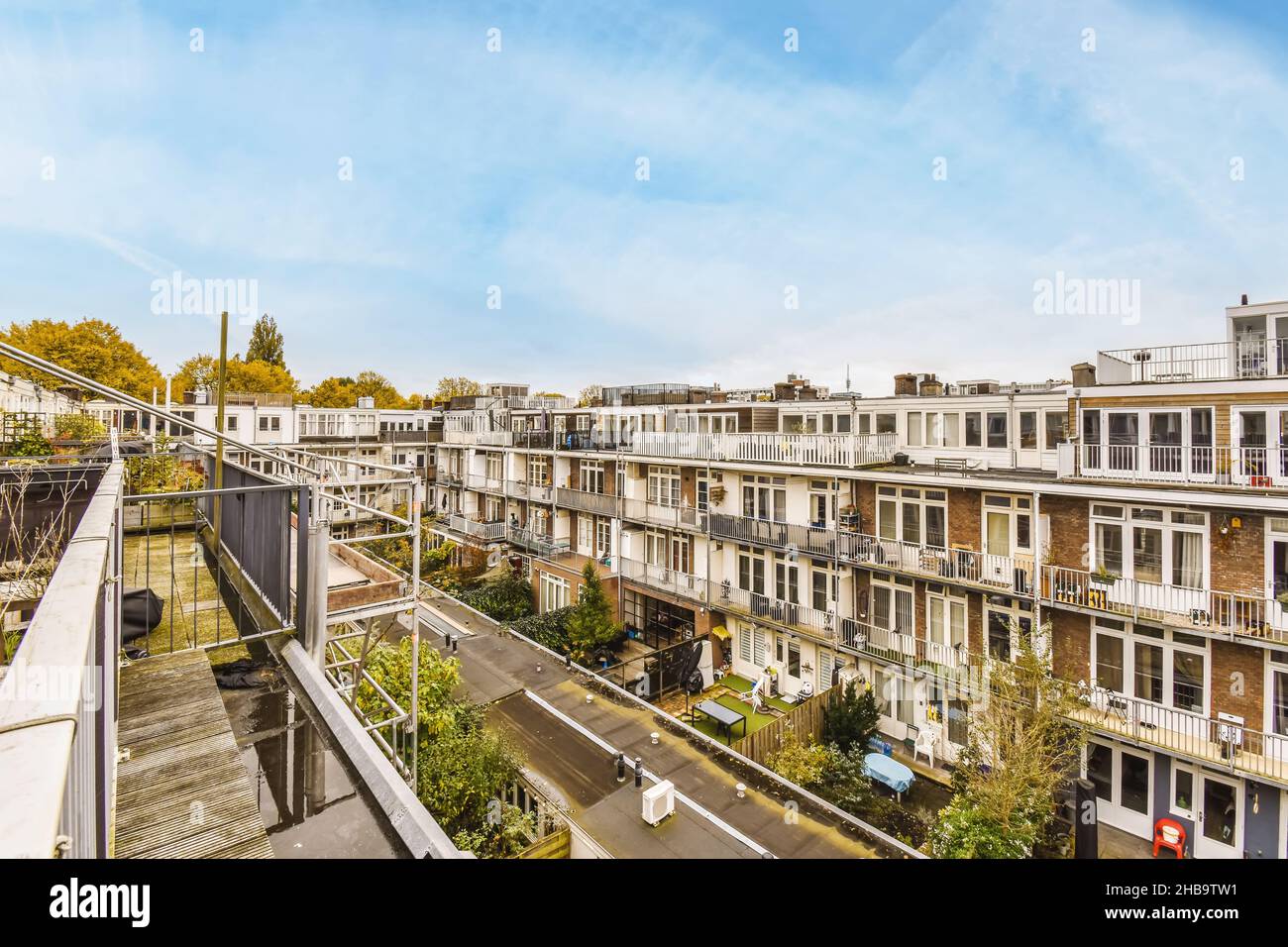 Aerial view of the street with buildings and trees Stock Photo - Alamy