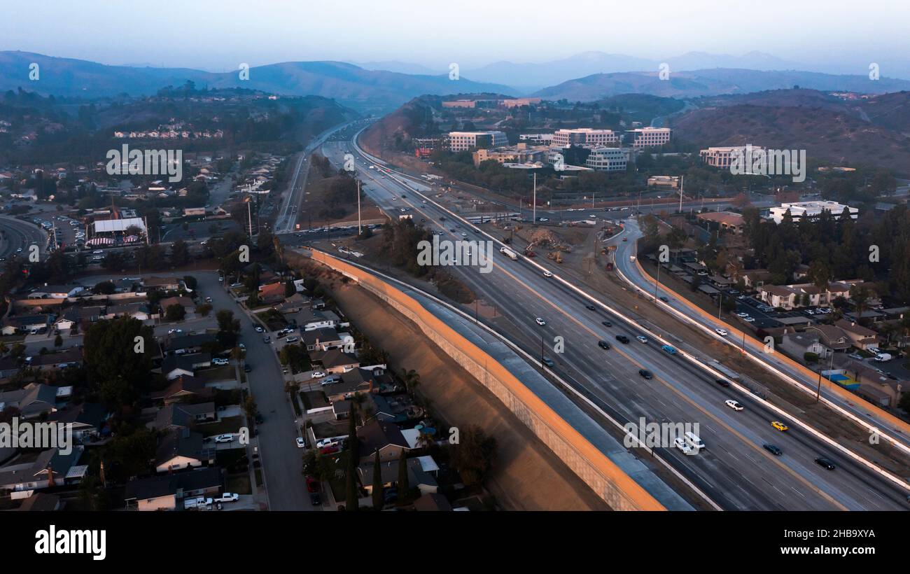 Sunset view of the 57 freeway as it passes through downtown Brea ...
