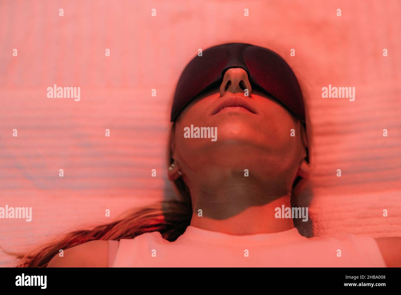 Chroma therapy. Red light therapy session Stock Photo - Alamy
