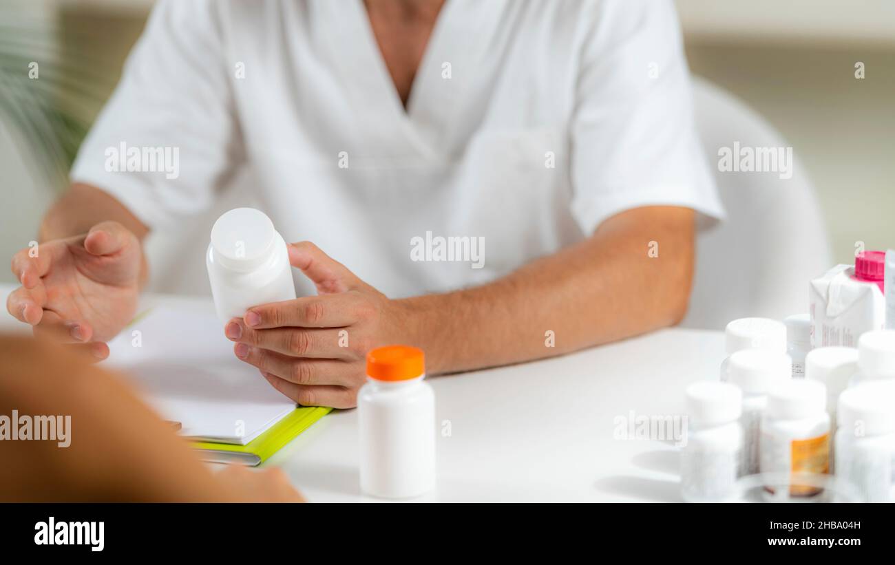 Doctor recommending supplements Stock Photo - Alamy