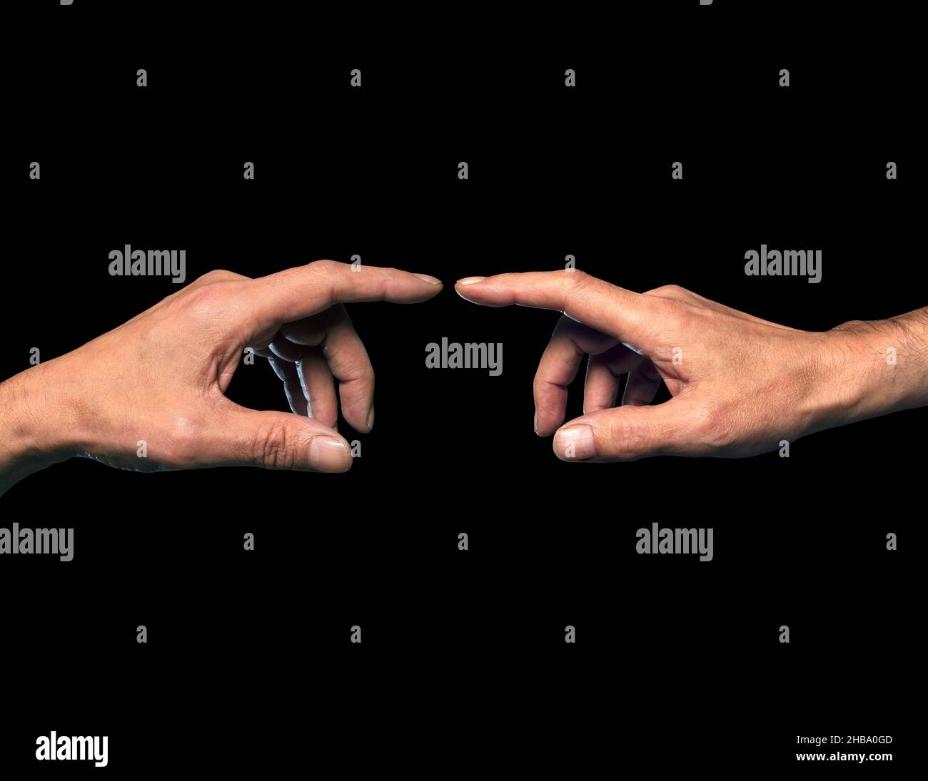 Hands reaching to touch Stock Photo - Alamy