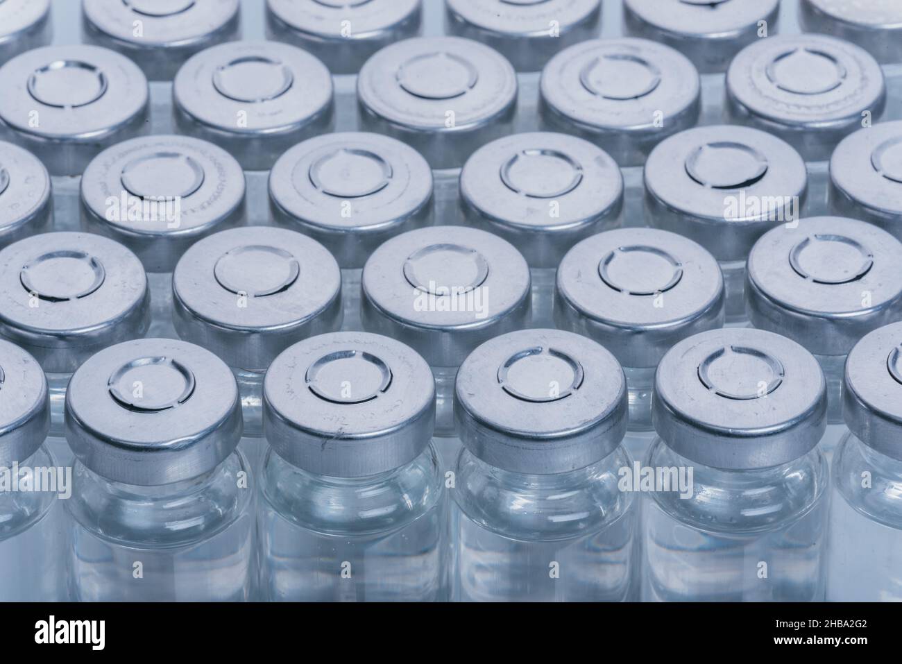 Glass medical ampoule vial for injection. Medicine is dry white drug ...