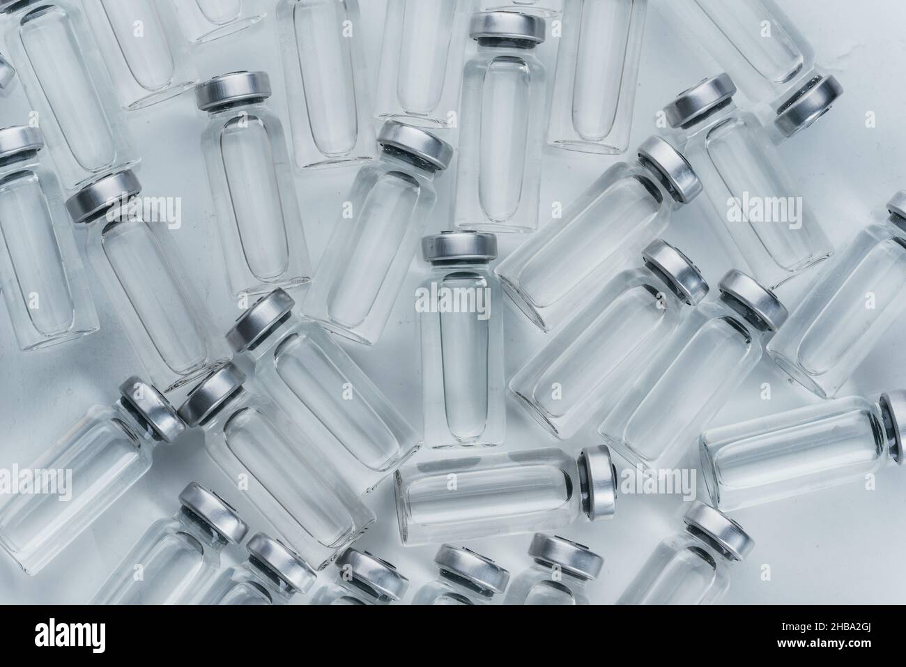 Glass medical ampoule vial for injection. Medicine is dry white drug ...