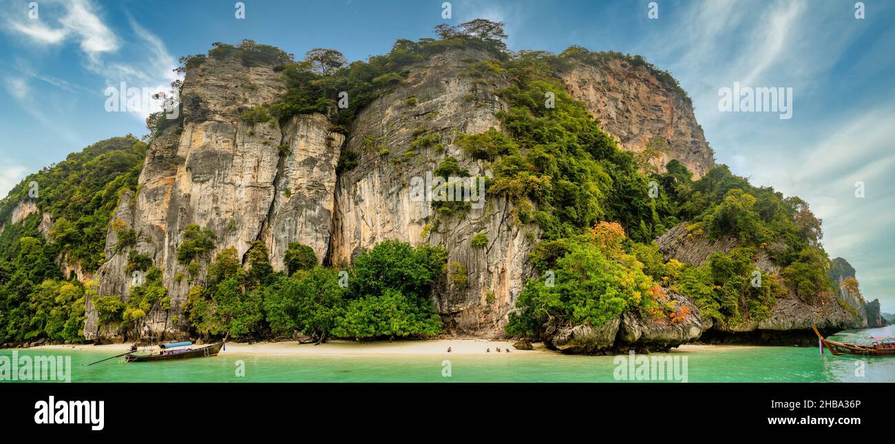 Ko Phi Phi's Limestone Cliffs with very colorful leaves Stock Photo - Alamy