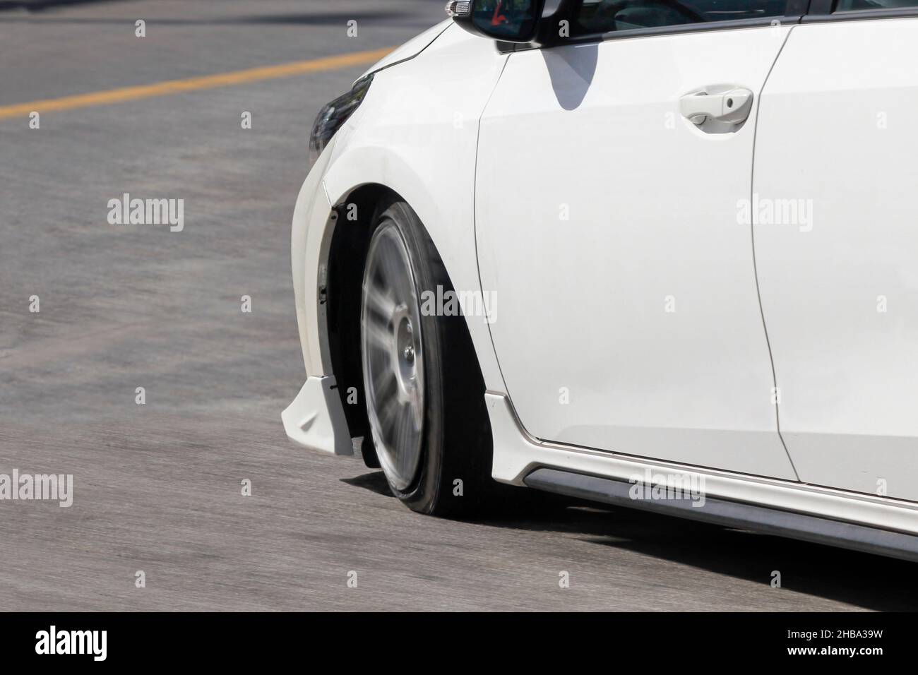 stress of tire in curve Stock Photo - Alamy