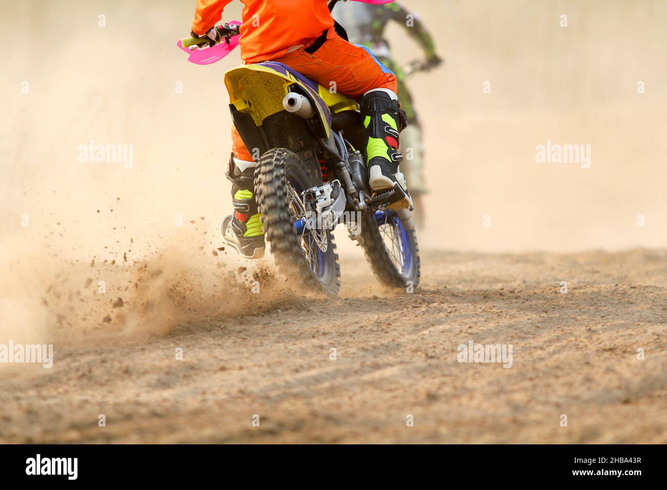 motocross racer accelerating speed in track Stock Photo - Alamy