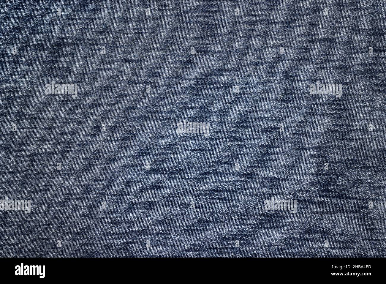 Rough dark blue cotton fabric texture with abstract pattern for ...