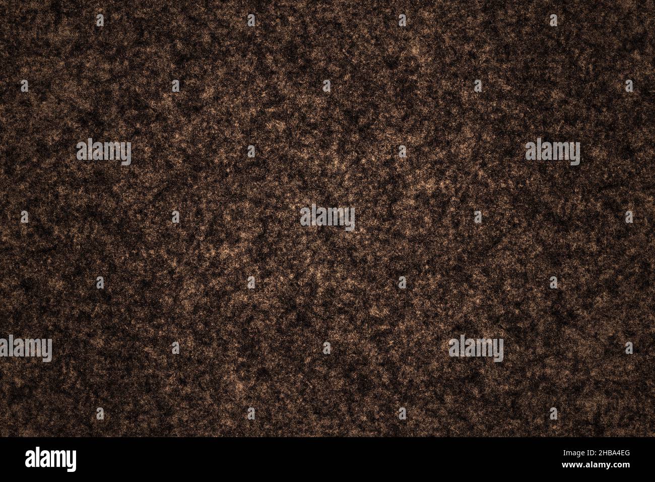 Distressed soft brown color metal surface with scattered heavy grunge ...