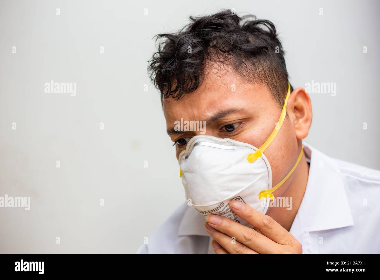 Asian men wear n95 mask protect covid 19 face close up on white ...