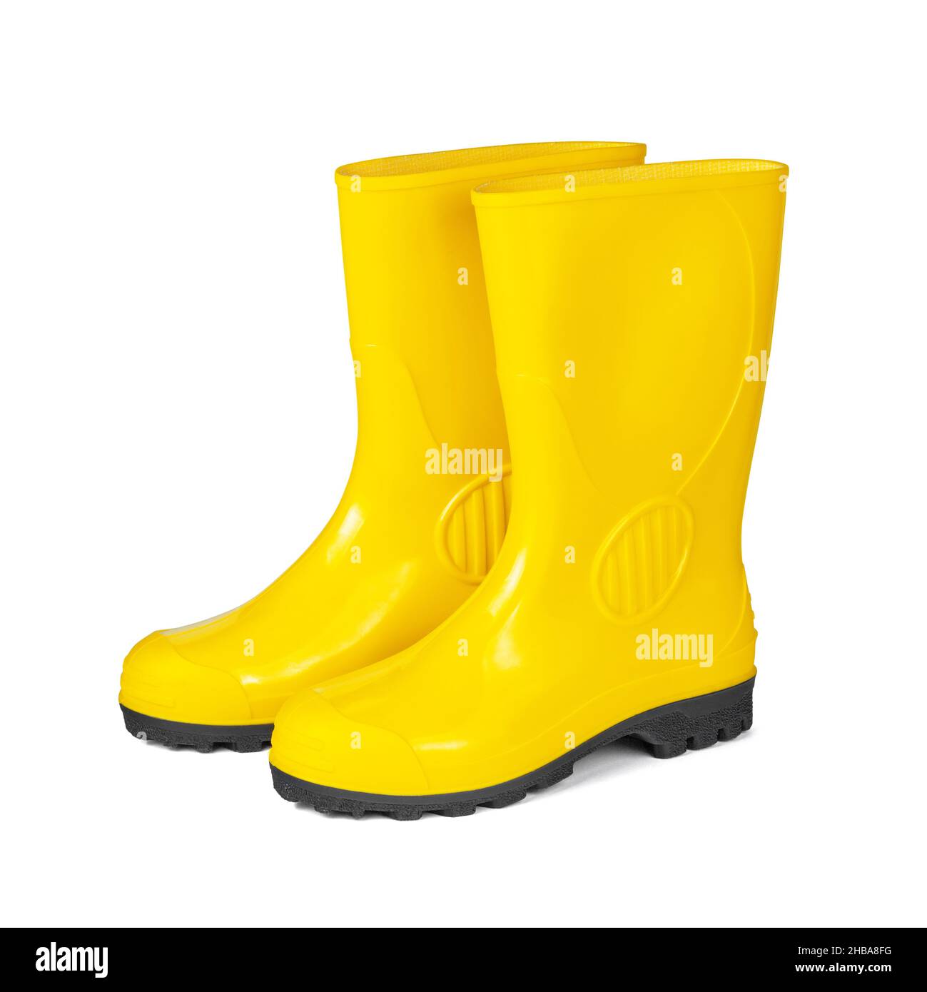 Yellow rubber boots with black soles isolated on white background Stock ...