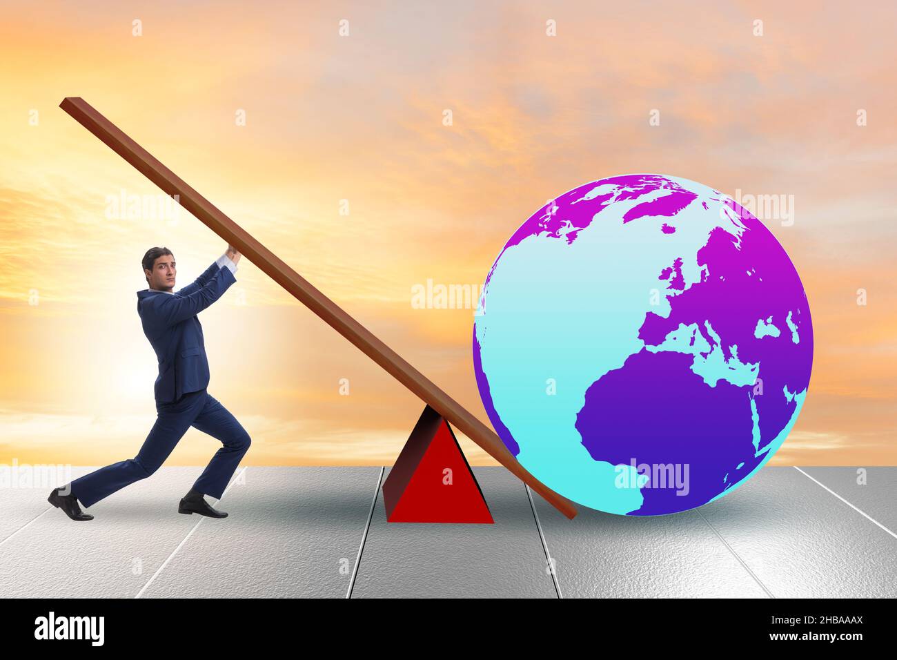 Businessman lifting the earth in the challenge concept Stock Photo - Alamy