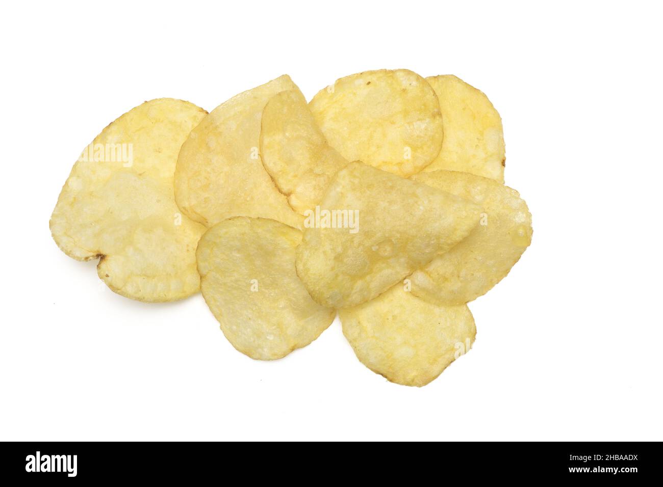 Close up of pile of golden brown fried crispy delicious potato chips ...