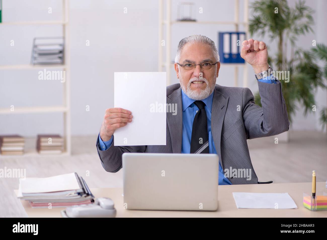 Successful old man laptop celebrating hi-res stock photography and ...