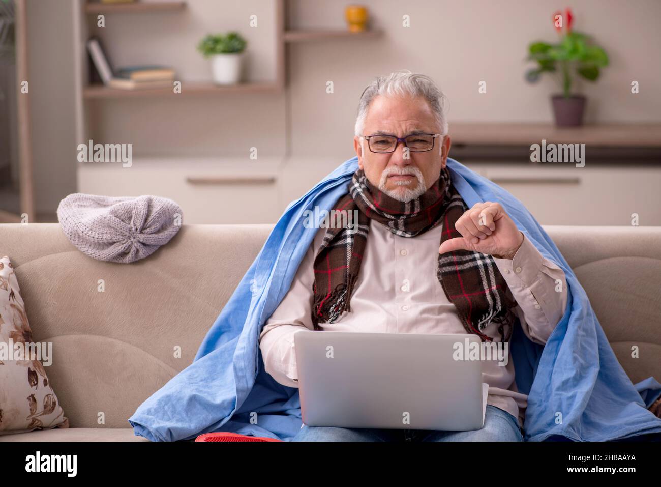 Sick old man coughing sitting hi-res stock photography and images - Alamy