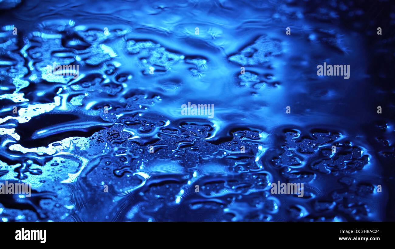 Image of rainy drops on dark blue background Stock Photo - Alamy