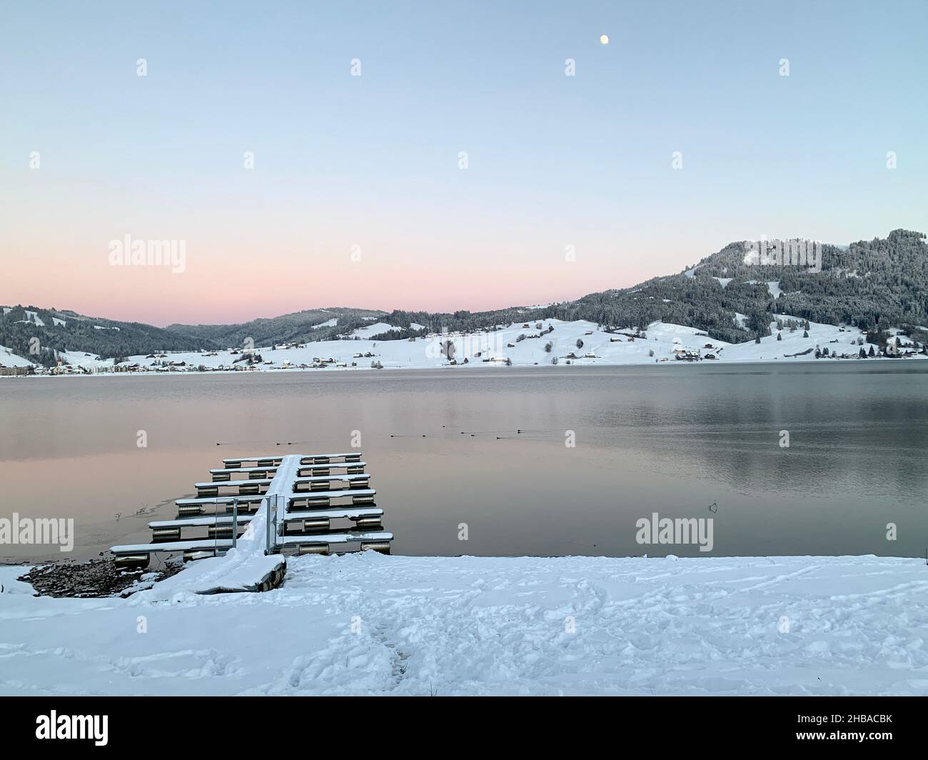 Sunset over lake Sihlsee in Switzerland, canton Schwyz in winter. There ...
