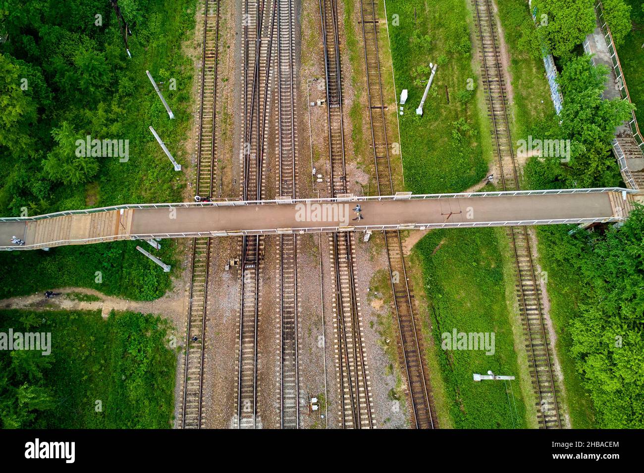 Pedestrian bridge over the railway tracks, view from above Stock Photo ...