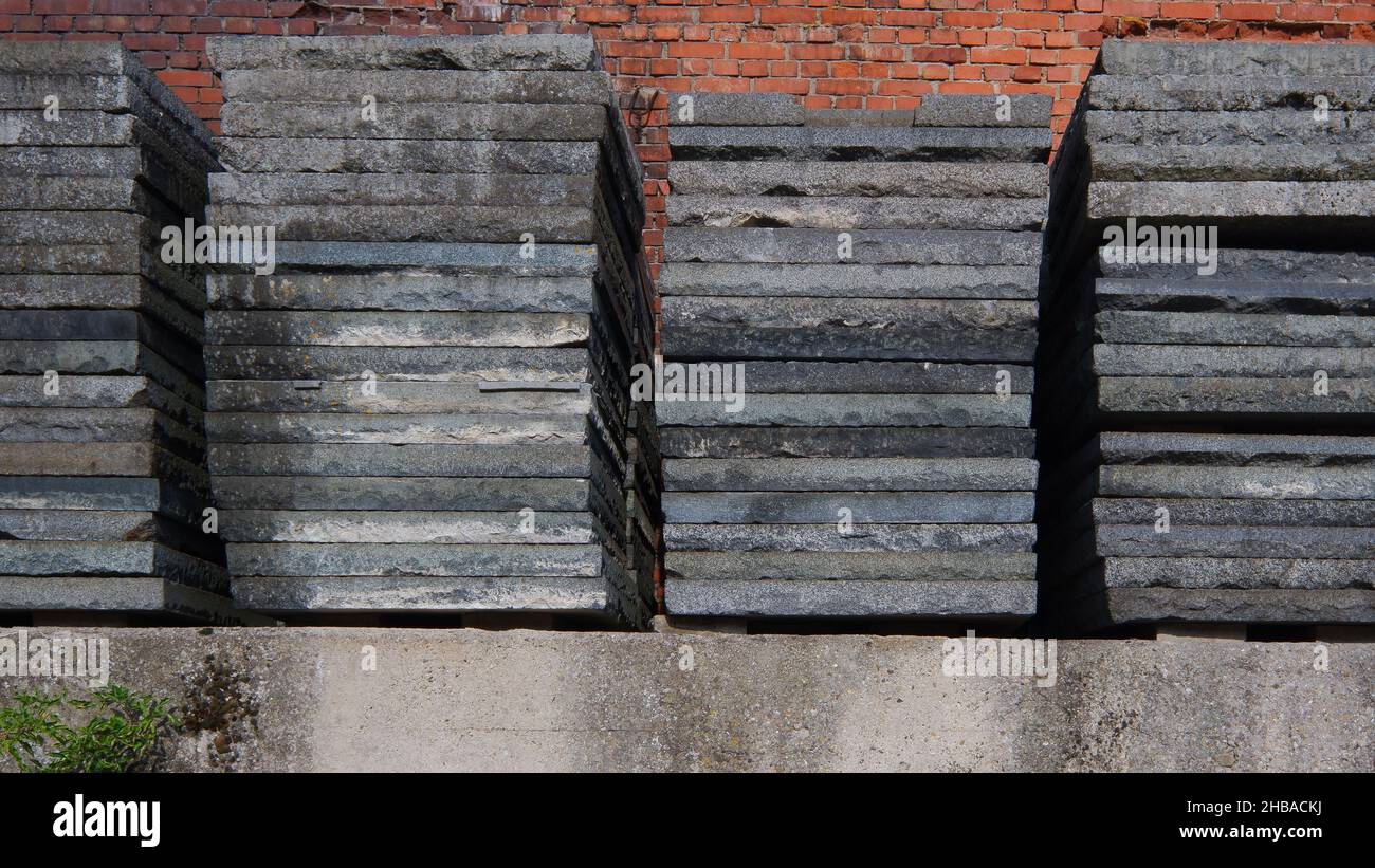 Stacks of concrete paving slabs tiles for laying a pavement Stock Photo ...