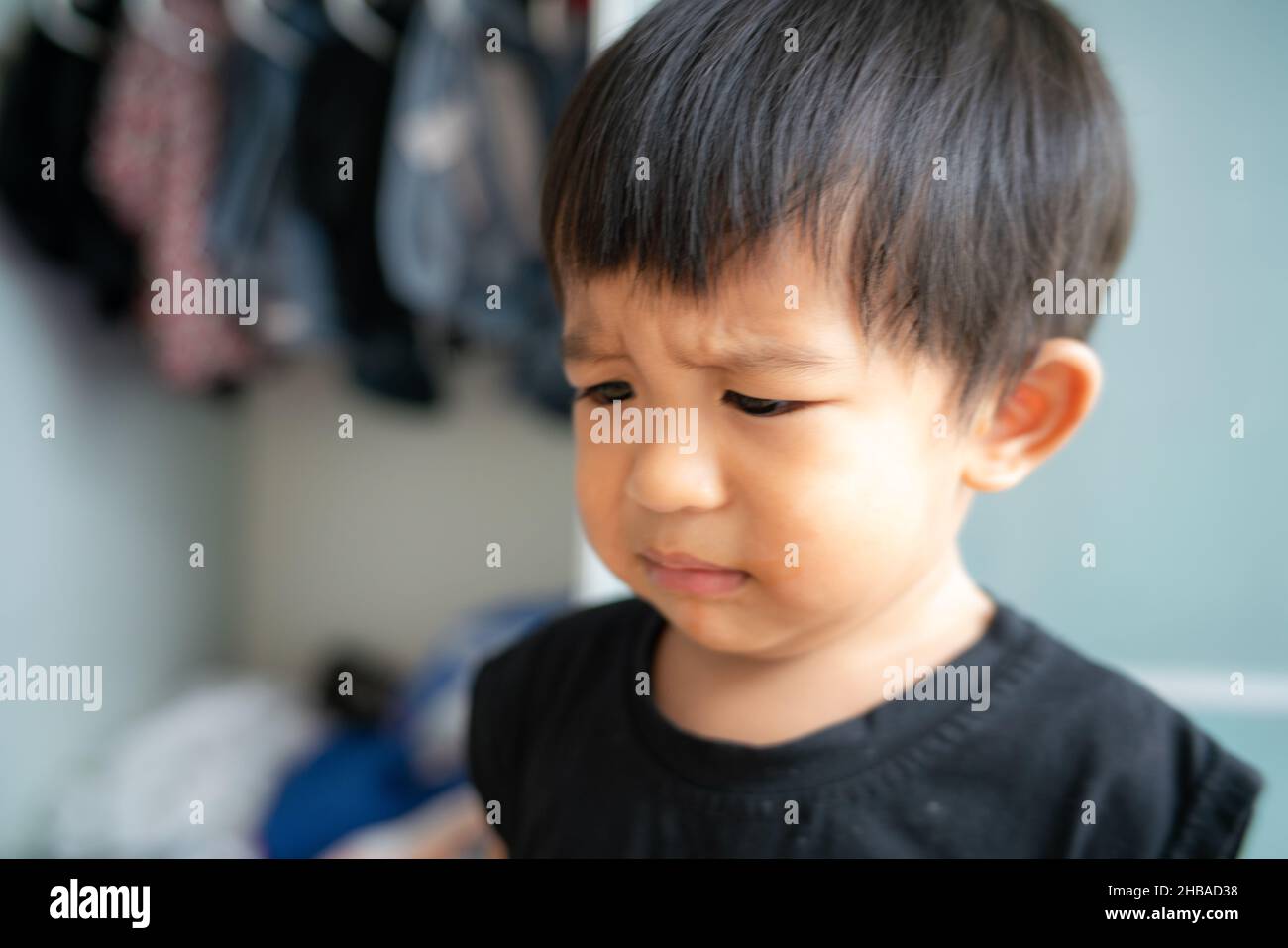 Little boy sad offended crying in house boy emotion Stock Photo - Alamy