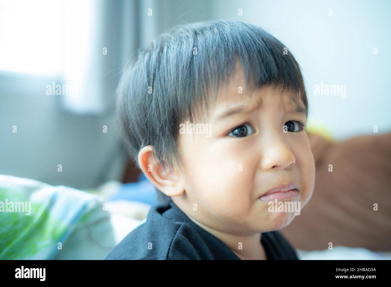 Little boy sad offended crying in house boy emotion Stock Photo - Alamy