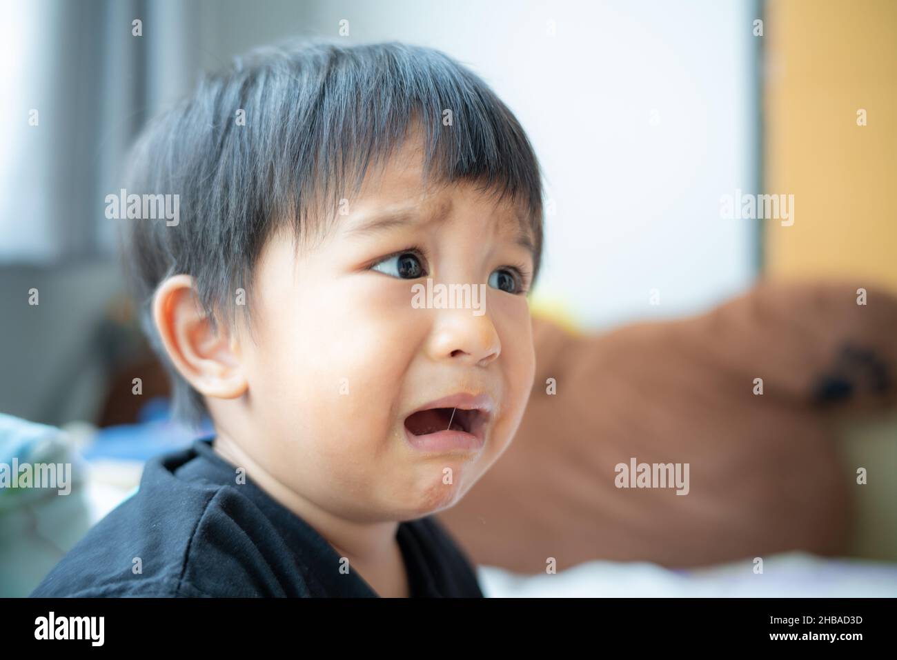 Little boy sad offended crying in house boy emotion Stock Photo - Alamy