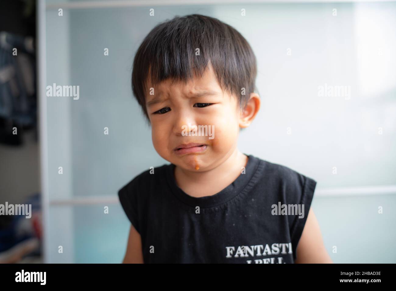 Little boy sad offended crying in house boy emotion Stock Photo - Alamy