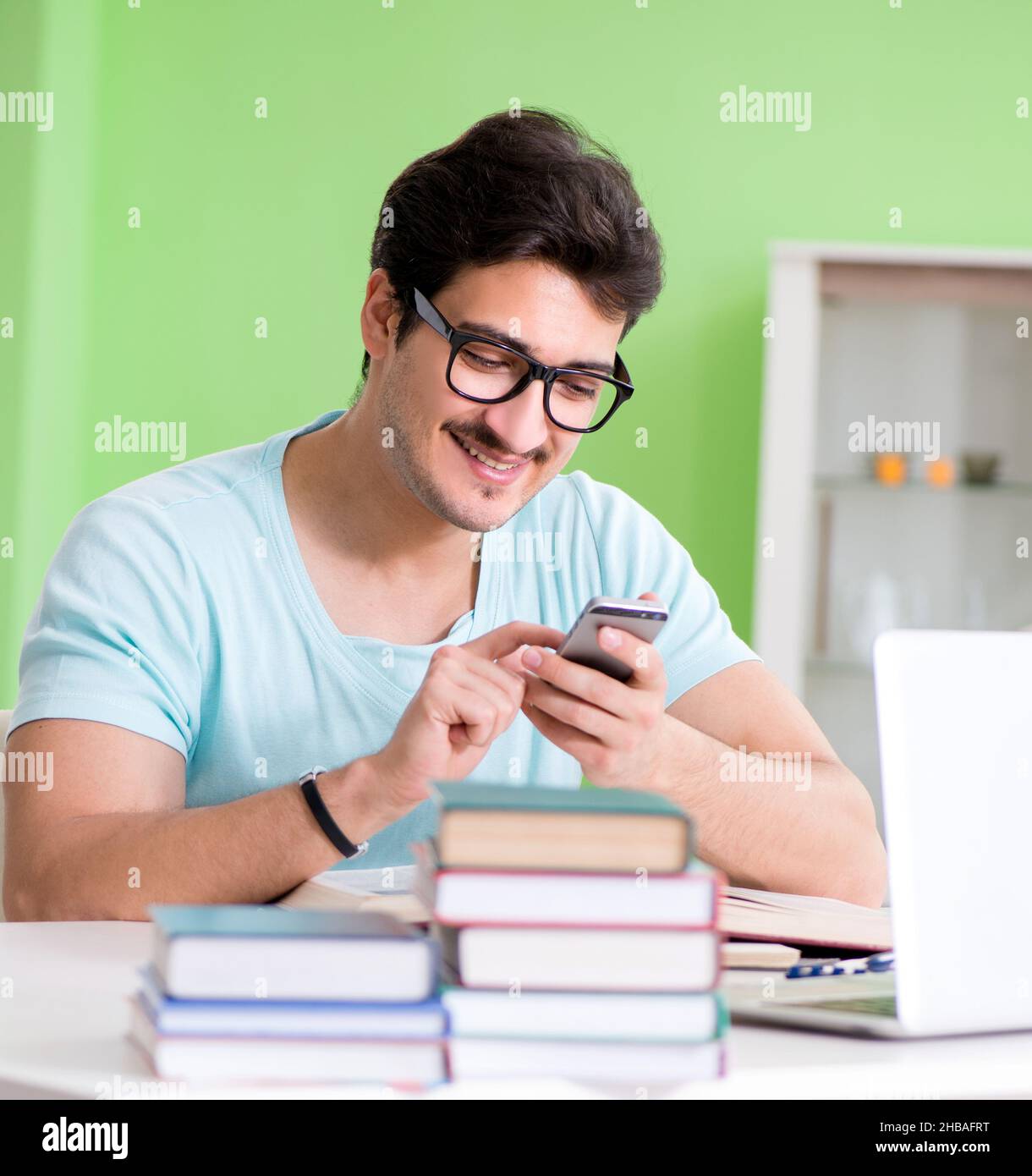 The student preparing for university exams at home Stock Photo - Alamy