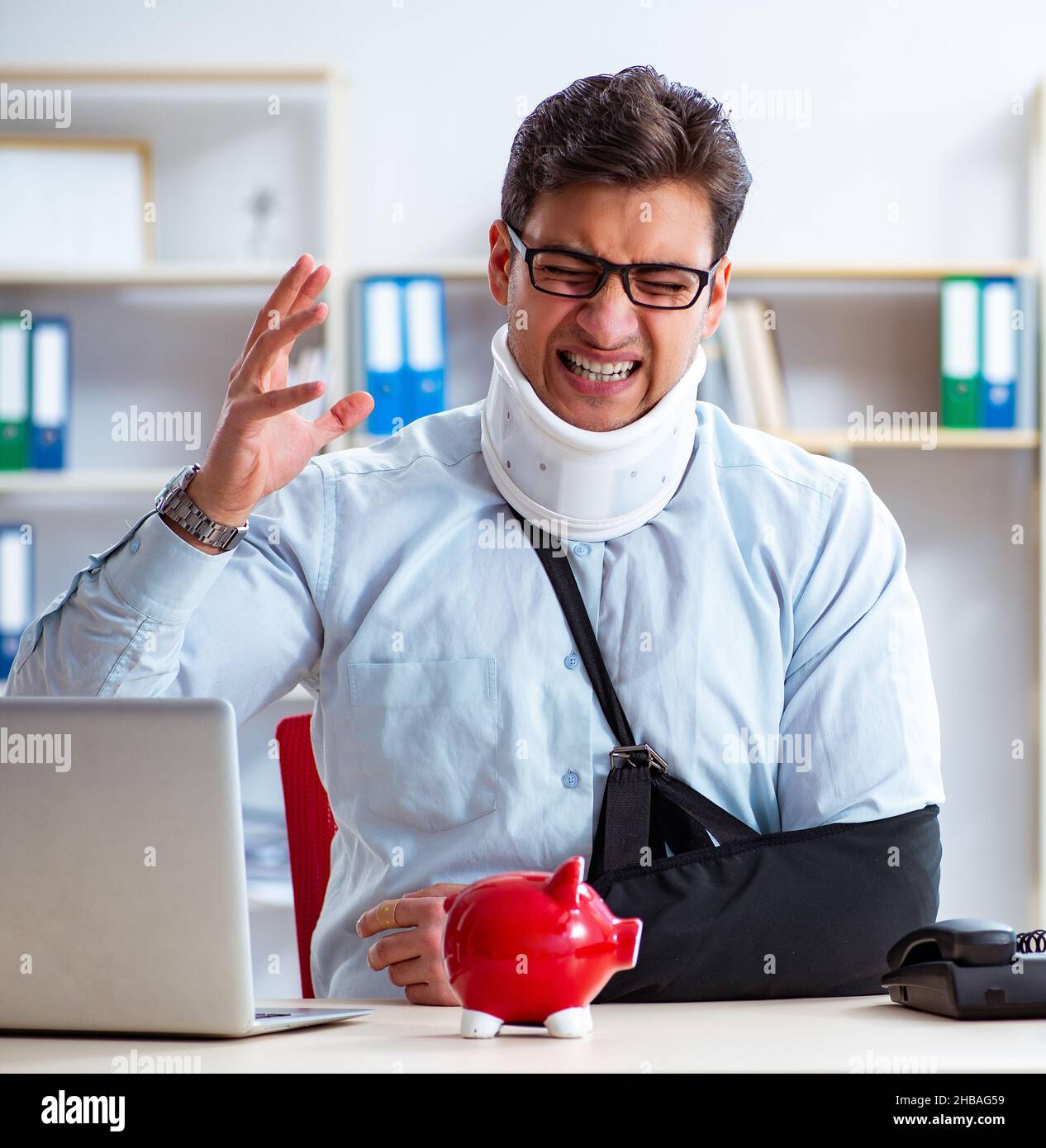 The businessman with broken arm working in office Stock Photo - Alamy
