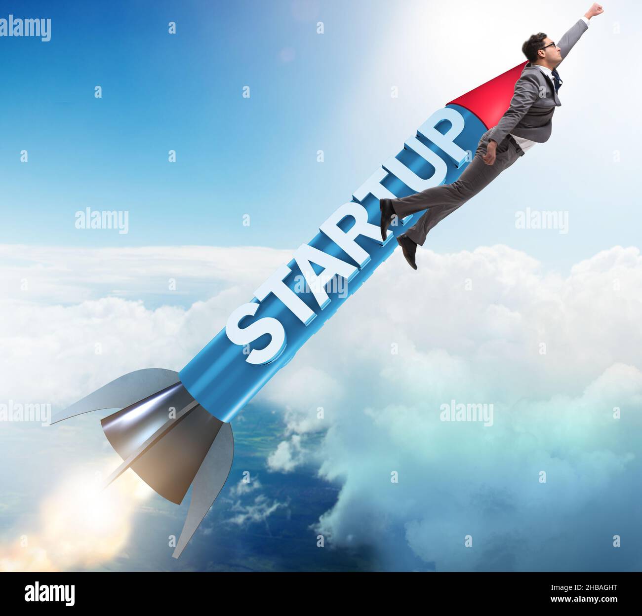 The businessman in start-up concept flying on rocket Stock Photo - Alamy