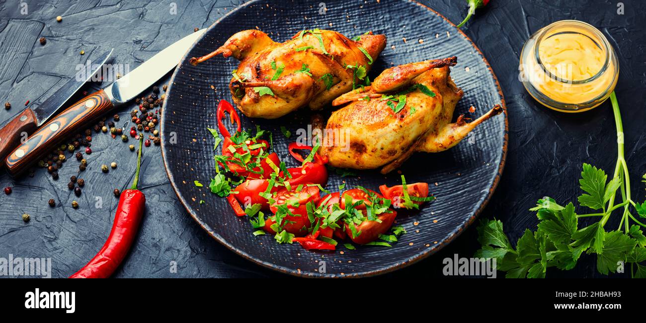 Juicy fried quail, dietary meat. Quail meat on the plate Stock Photo ...