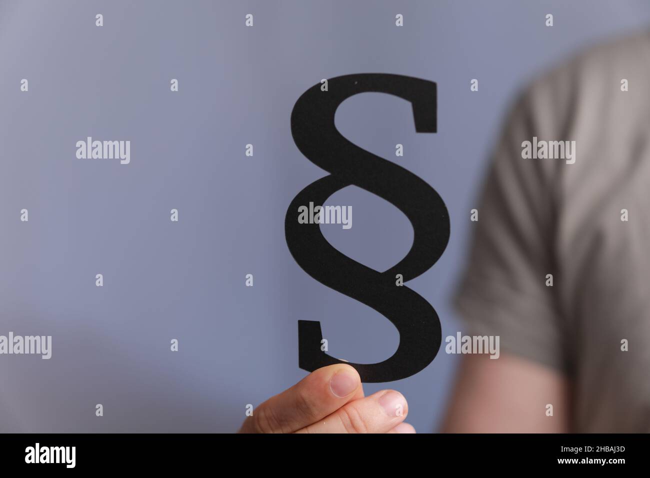 Digital illustration of law sign in the hand Stock Photo - Alamy