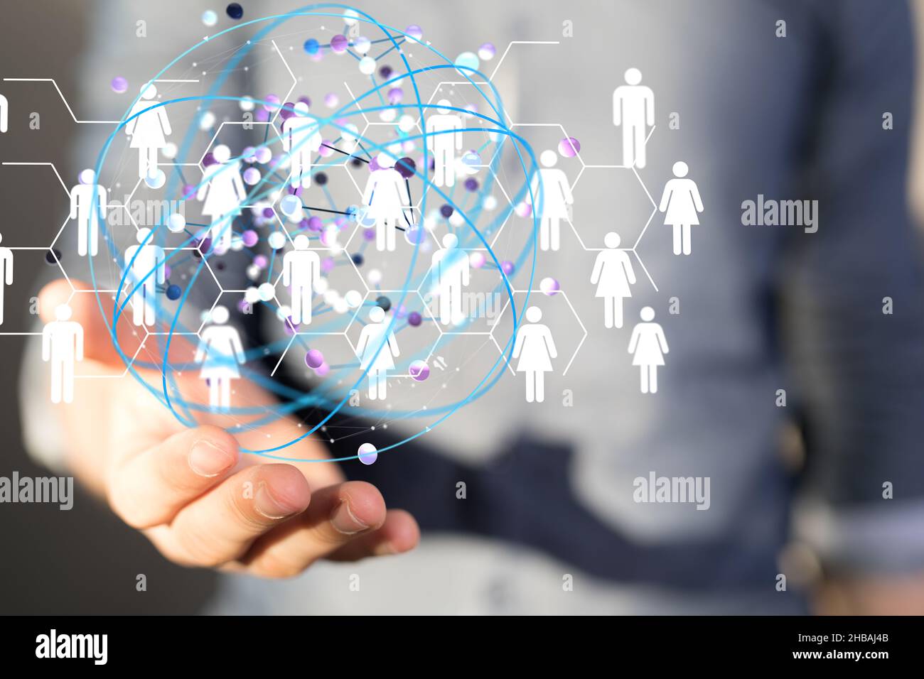 3D rendered people icons hovering over a person's hand Stock Photo - Alamy