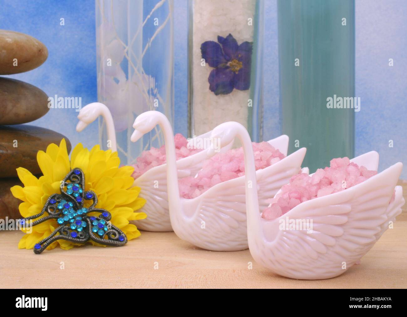 Pink Bath Salts in Plastic Swans With Bath Sponge Close up Stock Photo ...