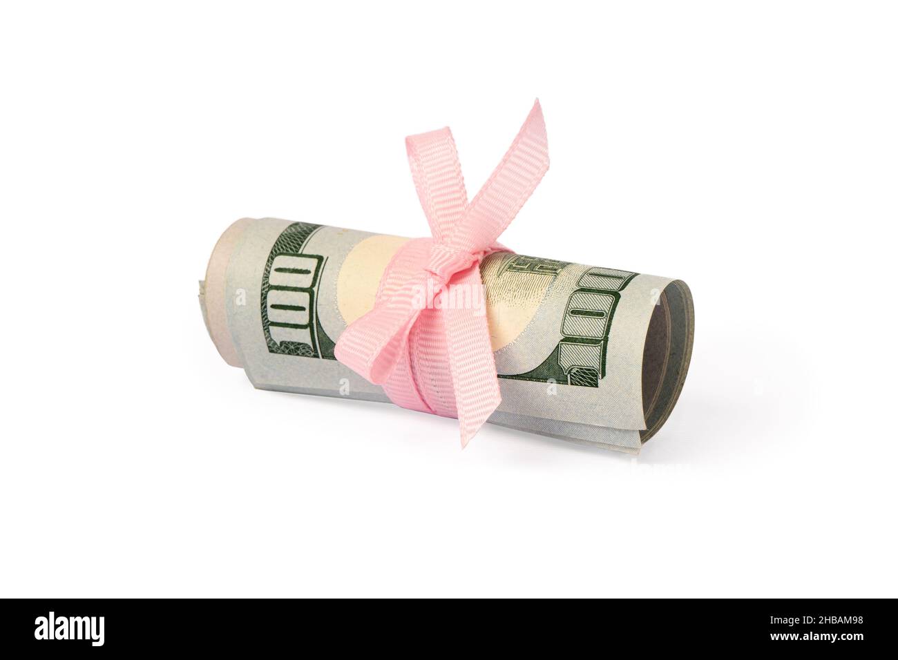 Dollar bills tied by pink ribbon isolated on white background. Money ...