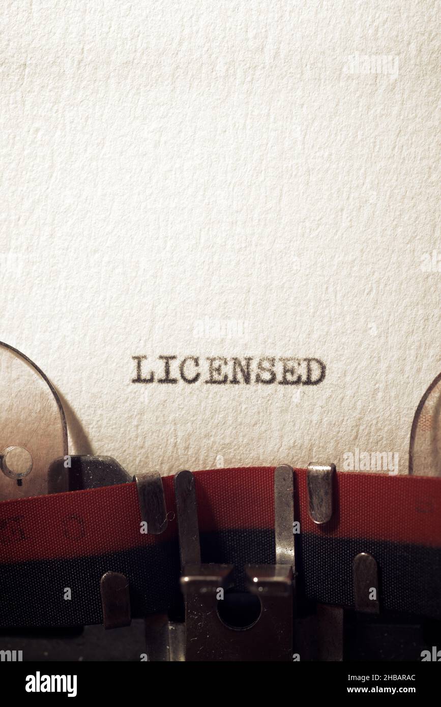 The word licensed written with a typewriter Stock Photo - Alamy