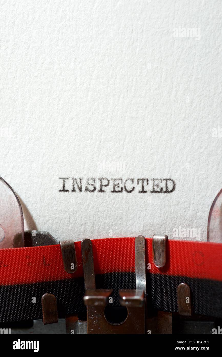 The word inspected written with a typewriter Stock Photo - Alamy