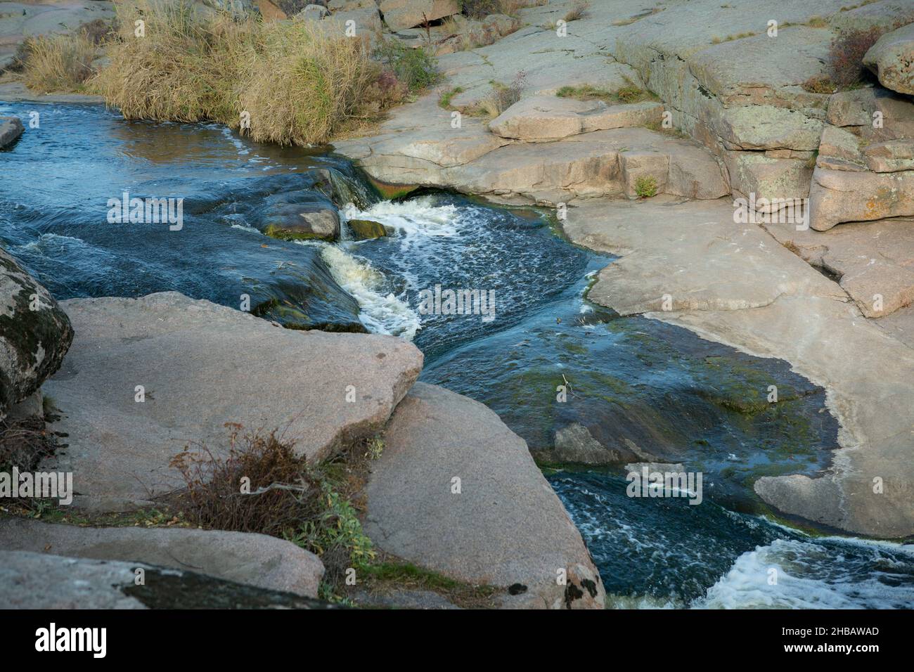 The murmuring waters of the Tokovsky waterfall in Ukraine. This is the ...