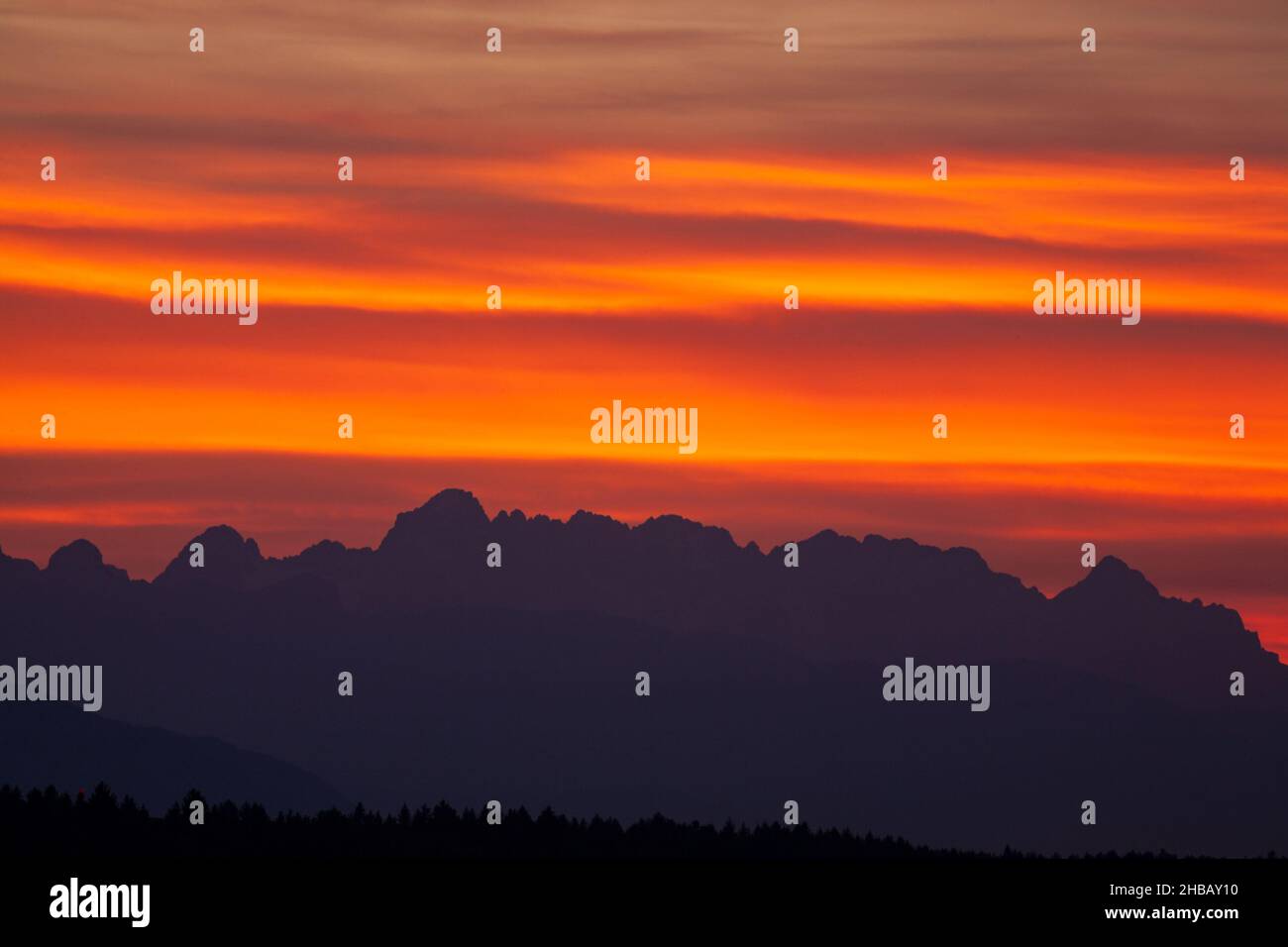 Sunset behind the Julian Alps mountains of Slovenia Stock Photo - Alamy