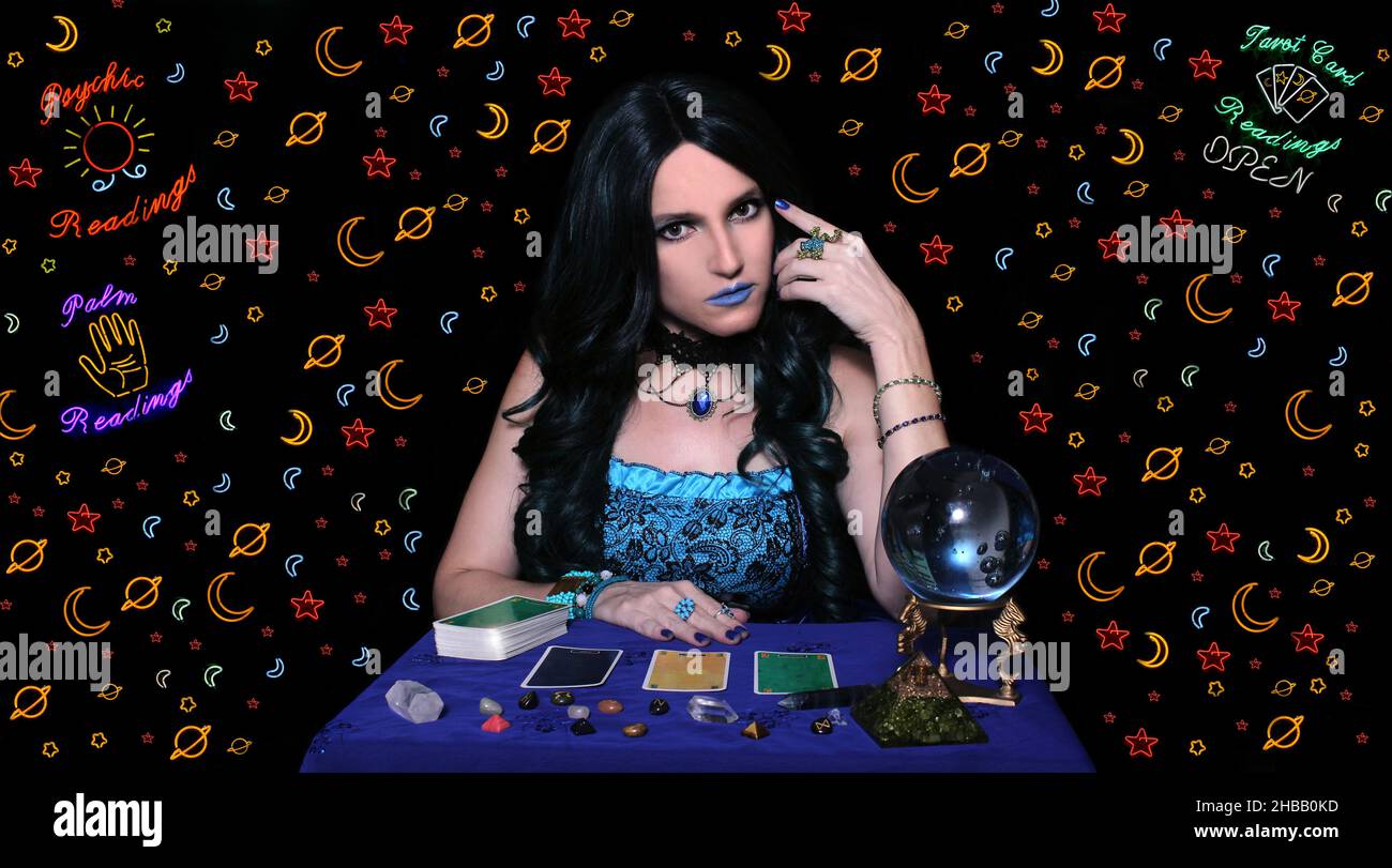 Psychic Tarot Card Reader With Vintage Neon Signs Stock Photo - Alamy