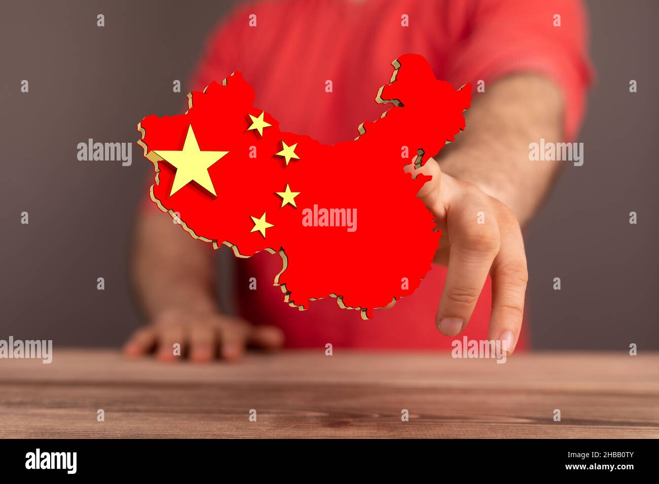 Finger touching a digital illustration of china map flag Stock Photo ...