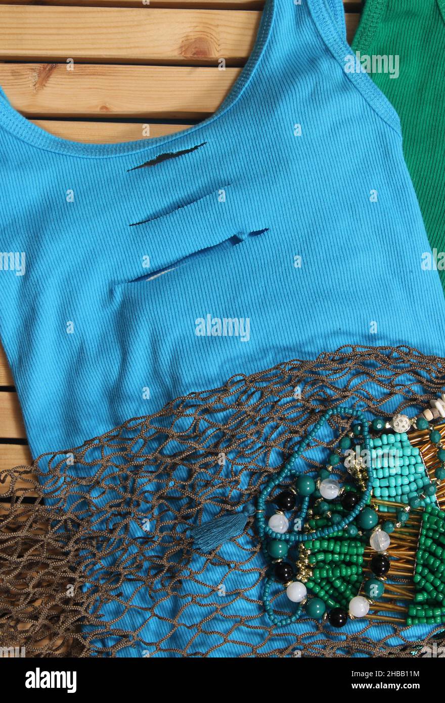 Mermaid Fashion With Jewelry and Fishing Net Stock Photo - Alamy