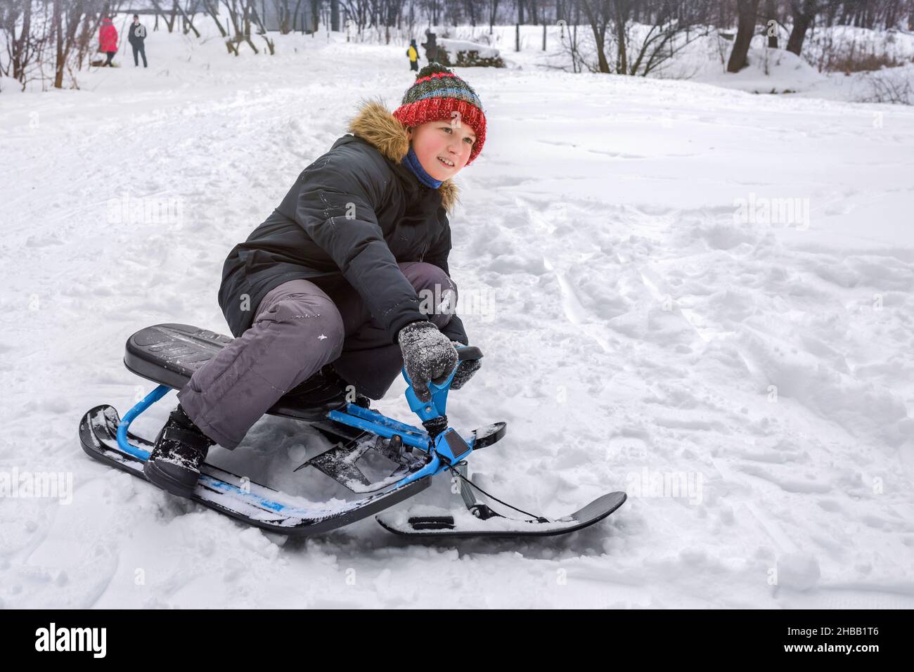 Teenager sledging hi-res stock photography and images - Alamy