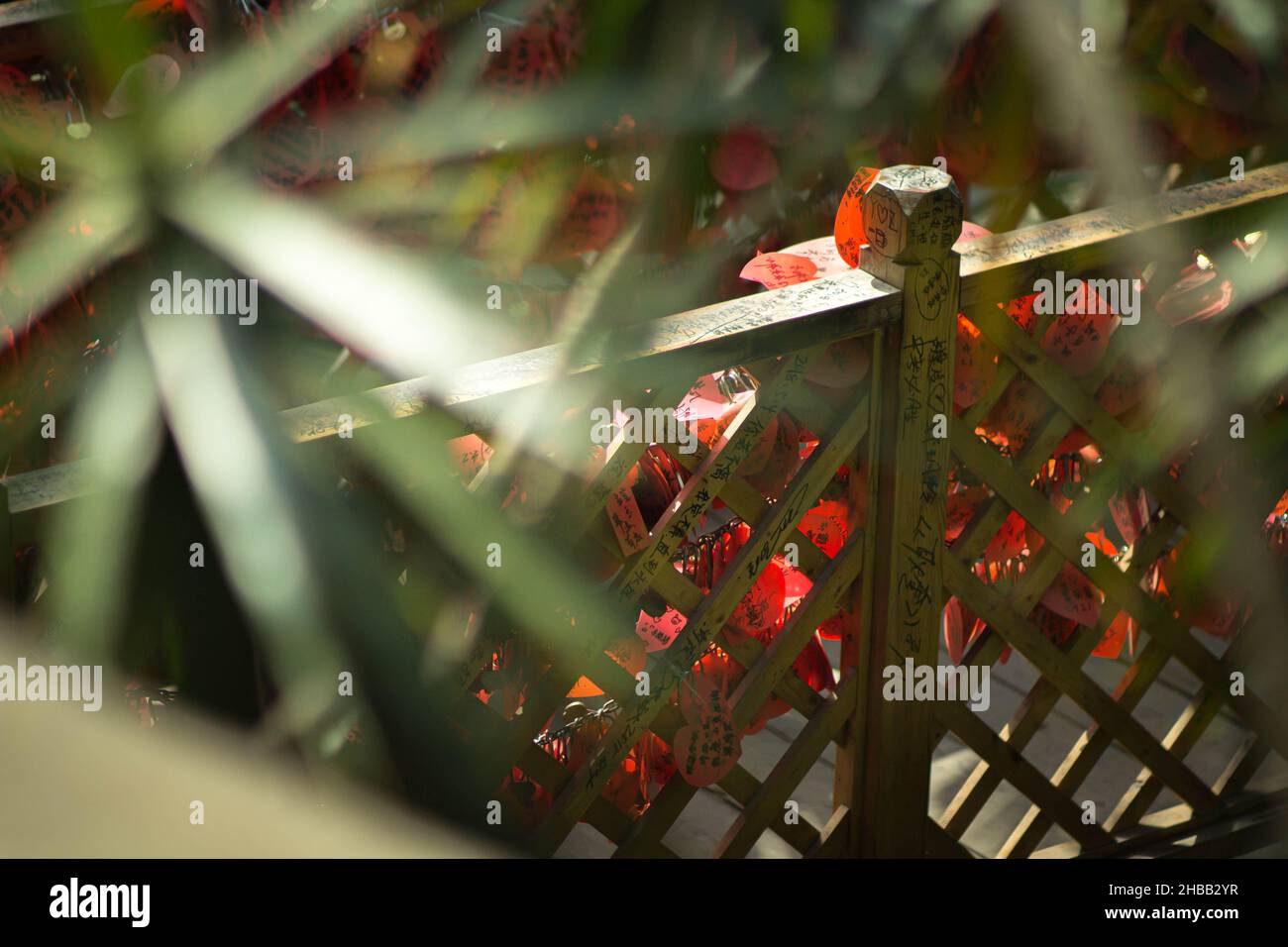 CHINESE FENCE WITH HIEROGLYPHS ON IT Stock Photo - Alamy