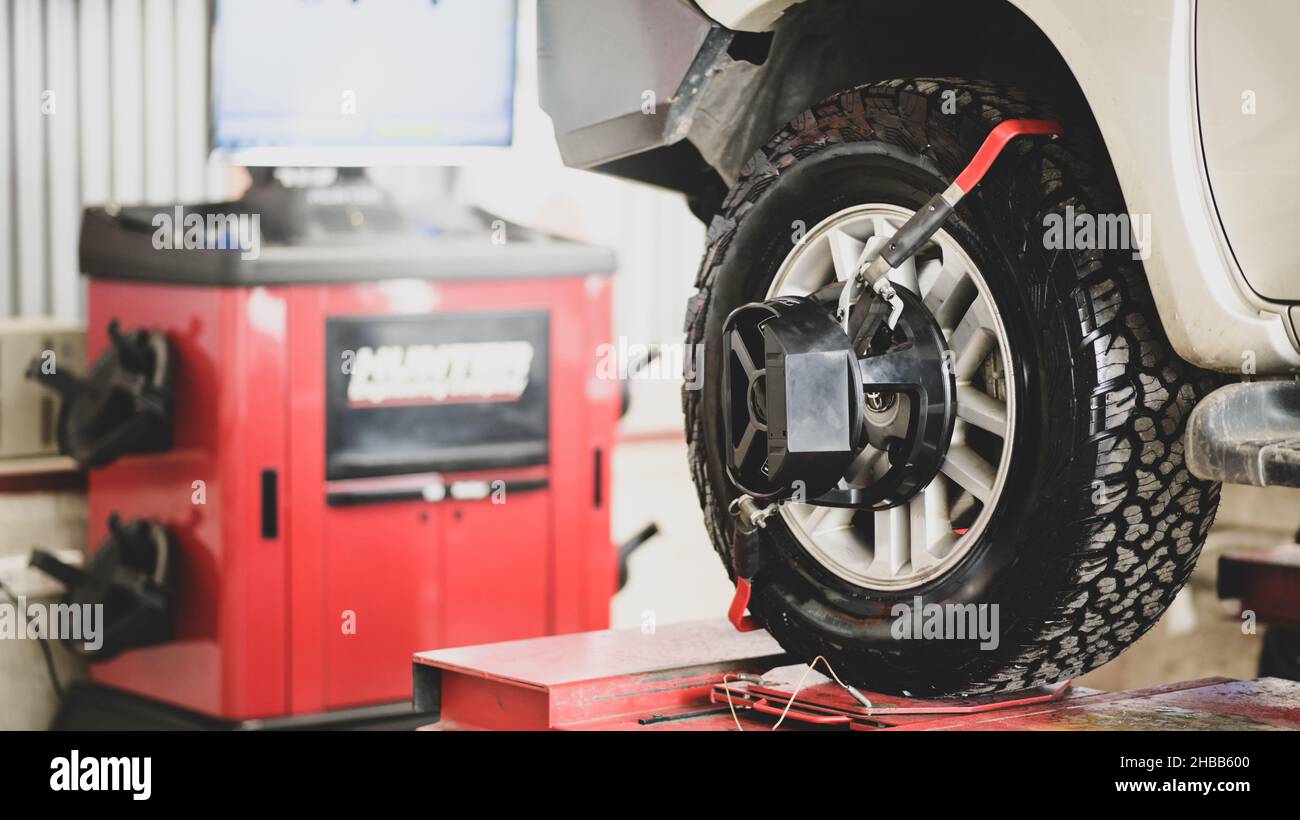 Car wheel alignment, car care, car suspension check Stock Photo - Alamy