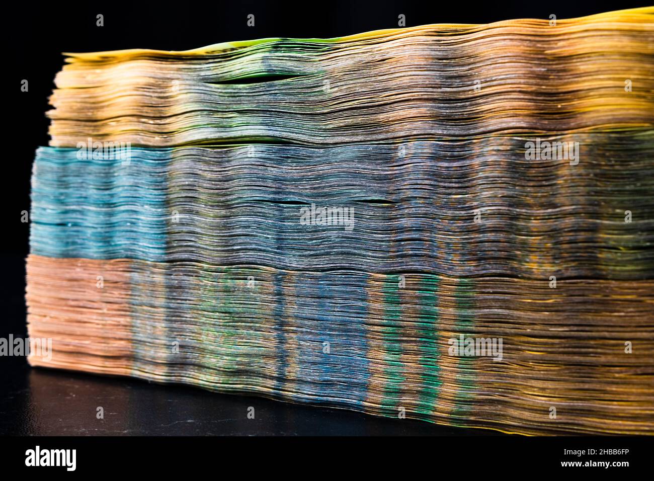 Stack of LEI Romanian money isolated on a dark background Stock Photo ...