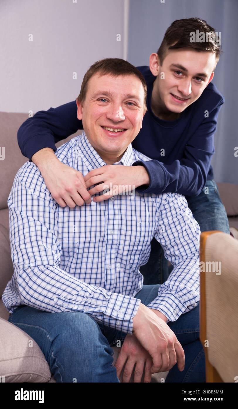 Portrait of guy with his father who are resting together Stock Photo ...