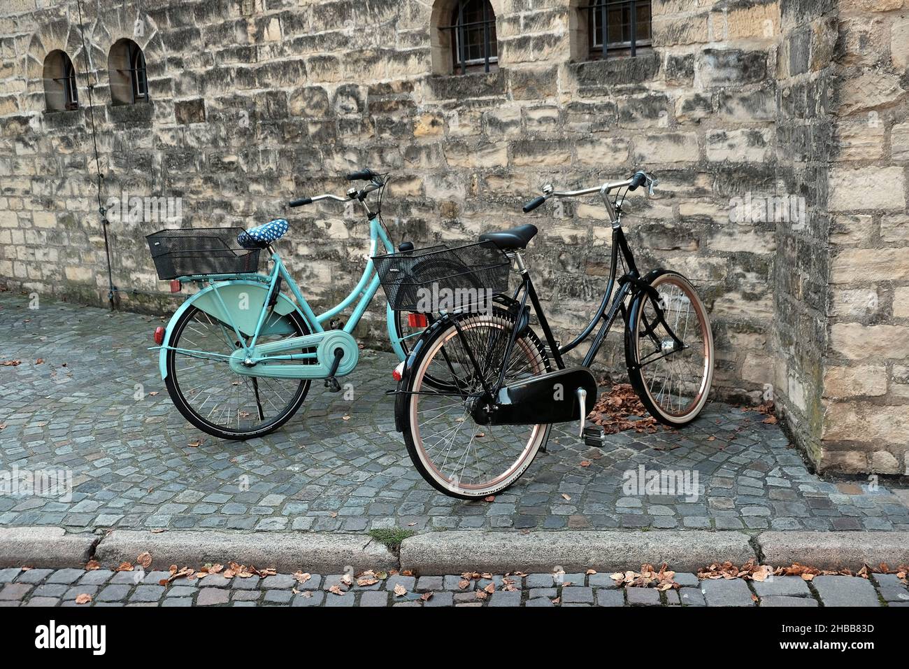 Bicycles parked near wall hi-res stock photography and images - Alamy