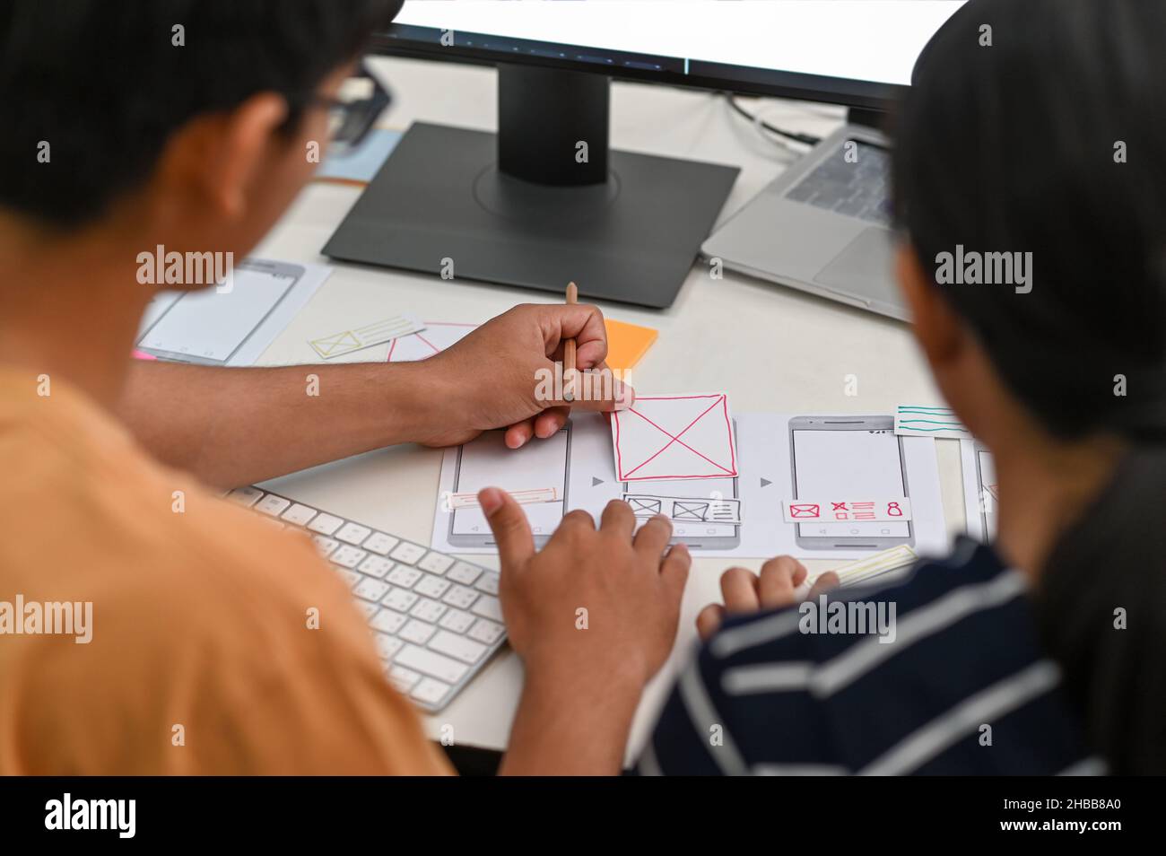 UX , UI graphic designer team drawing application for smartphone Stock ...